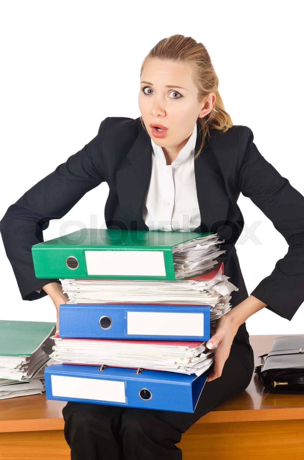 Woman with lots of work | Stock image | Colourbox