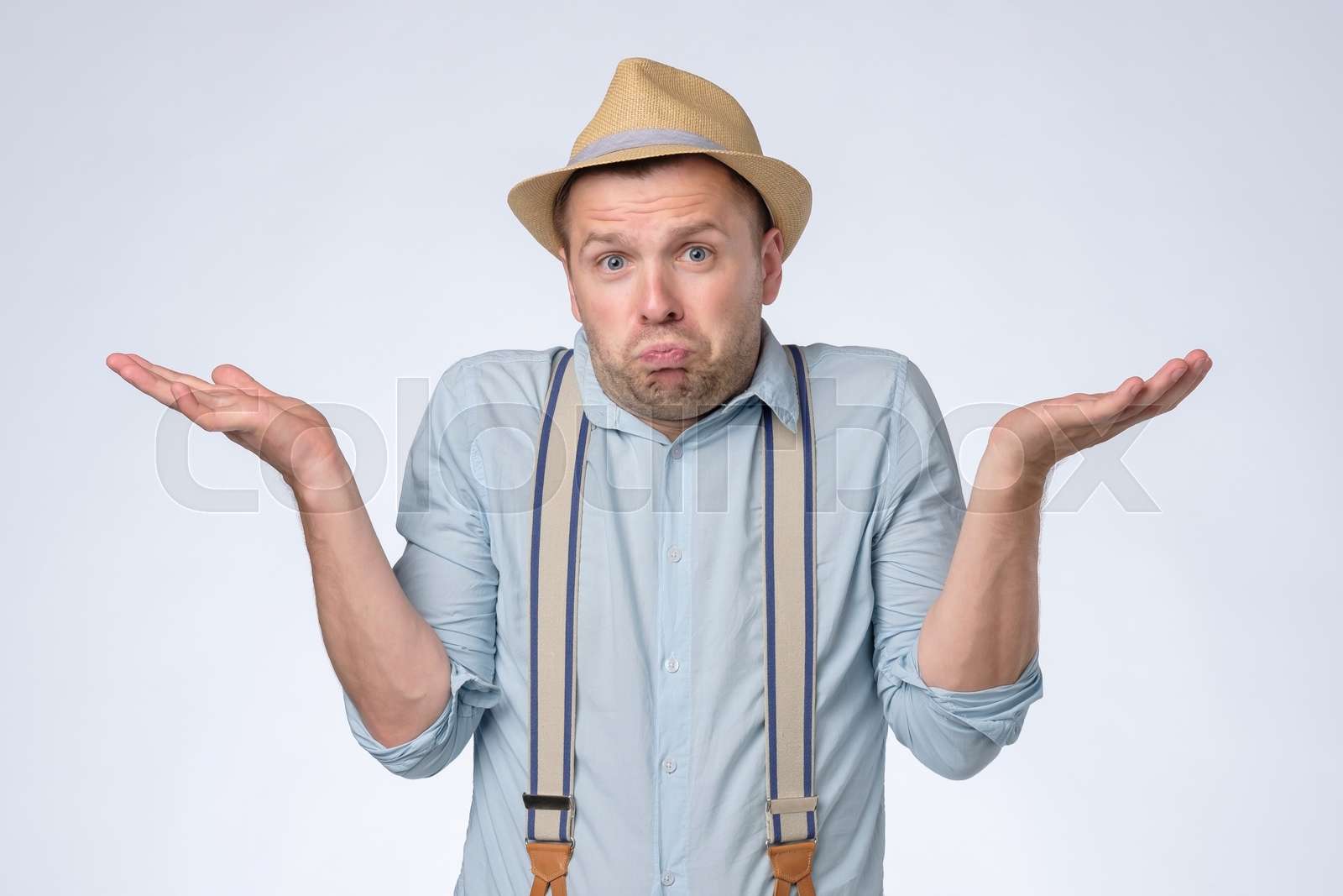 Clueless man shrugging with shoulders having no idea what to do | Stock ...