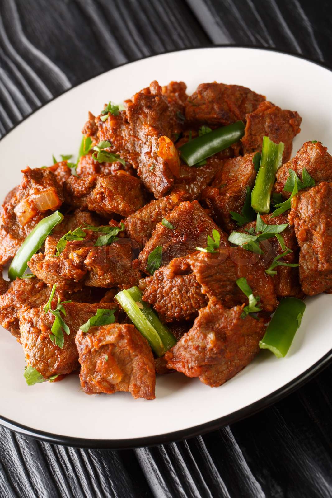 Tibs is a popular Ethiopian dish of sautéed beef flavored with niter ...