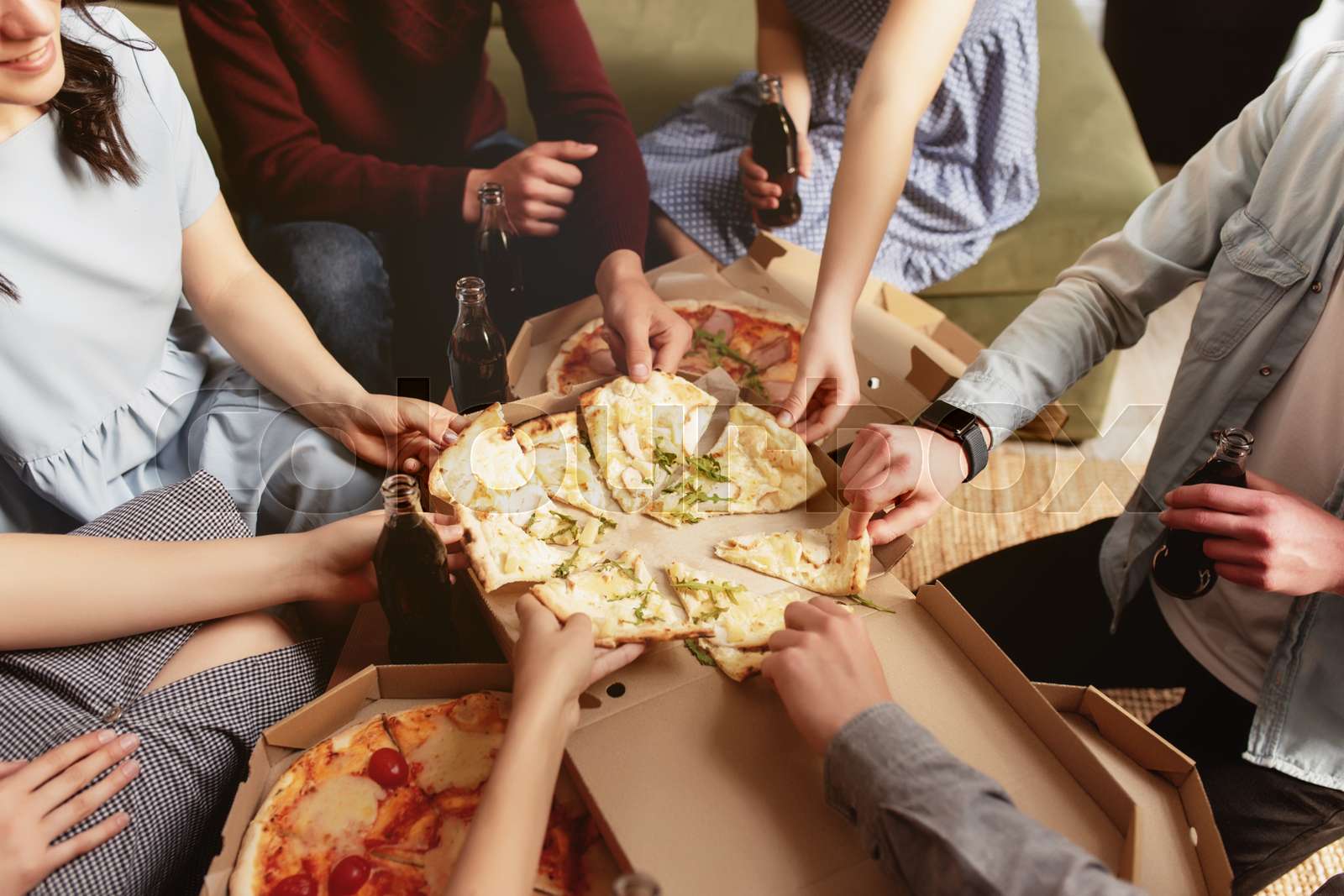 Groups Of People Eating Pizza