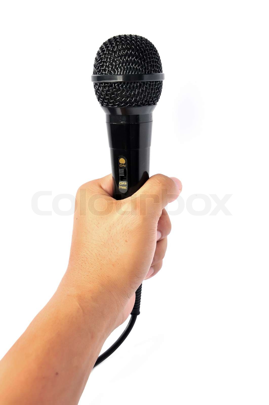 Hand with microphone | Stock image | Colourbox
