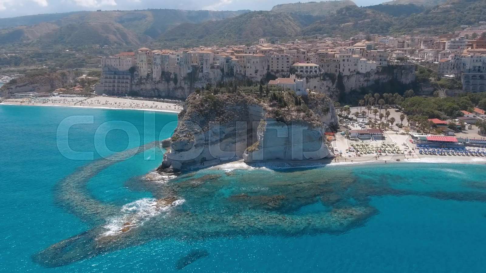 Calabria coastline in summer season. Tropea skyline with crystal clear ...