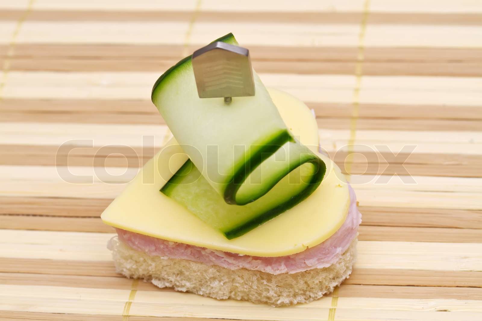 Canapes with ham and cheese | Stock image | Colourbox
