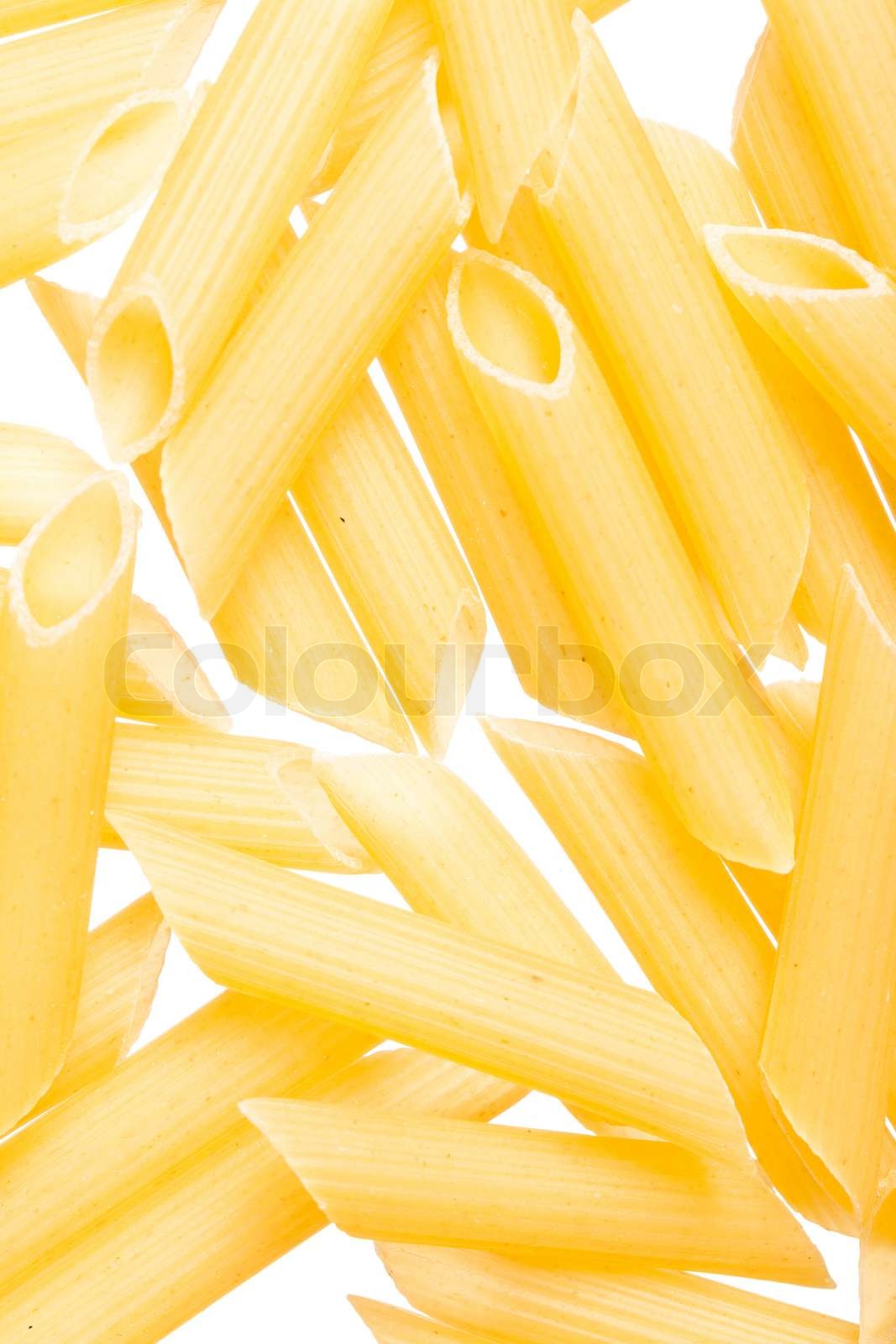 Italian dried macaroni, isolated in white | Stock image | Colourbox