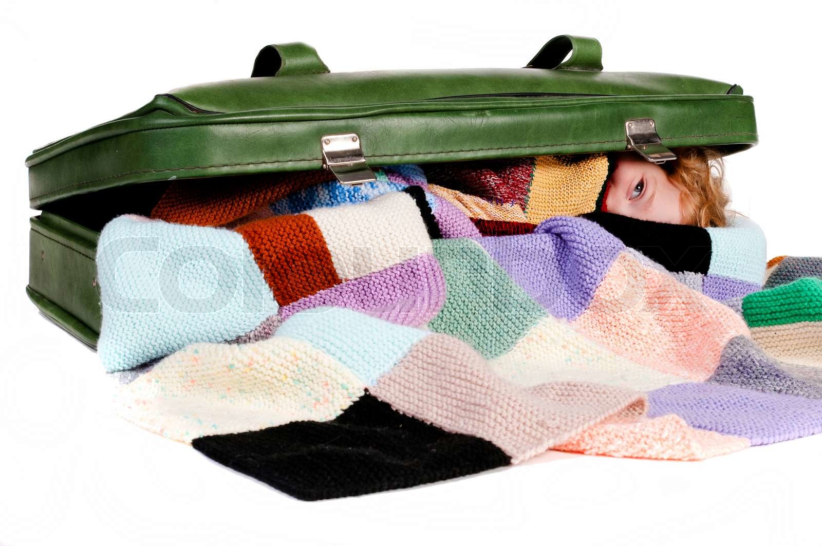 girl hidden in a suitcase | Stock image | Colourbox