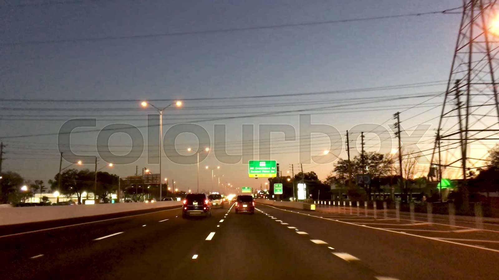 Driving along the Florida interstate at night, view from the car ...