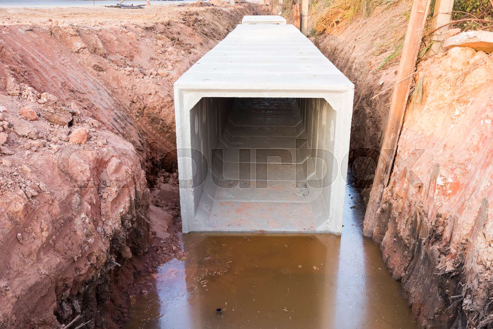 Large size square concrete manholes are installed at construction site ...