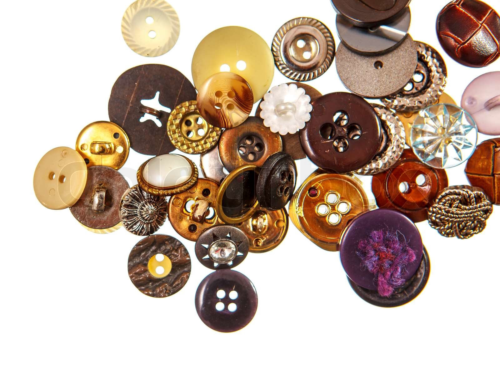 Sewing buttons on white | Stock image | Colourbox