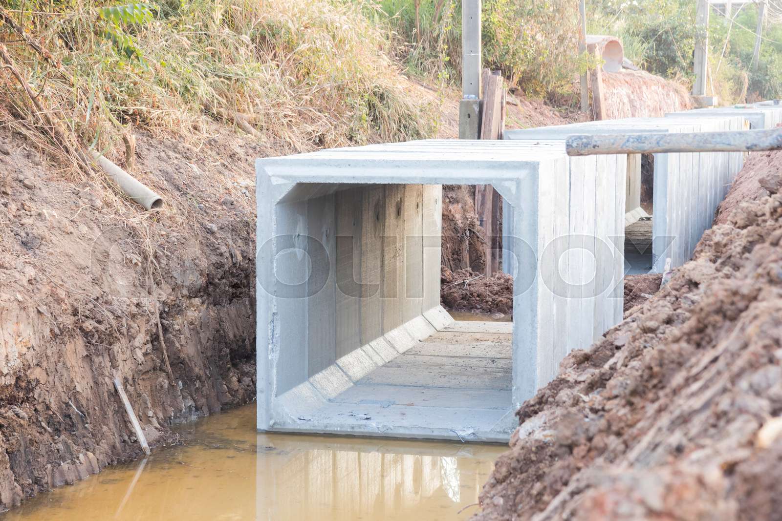 Large size square concrete manholes are installed at construction site ...