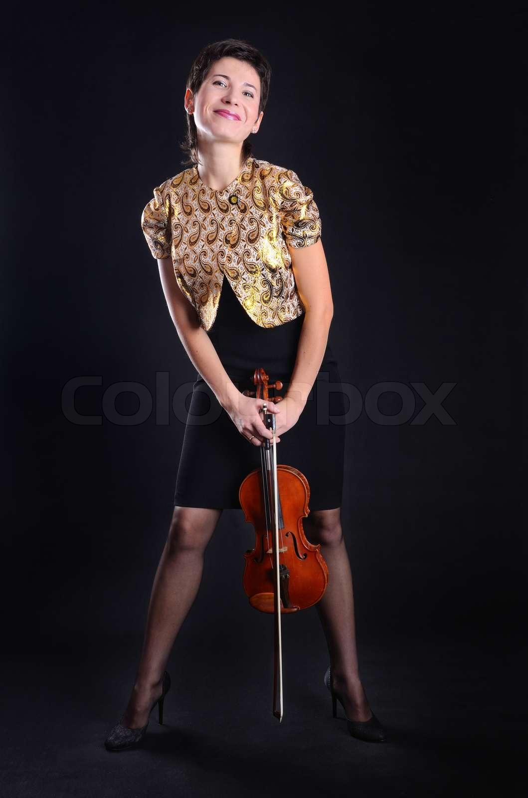Pretty violinist | Stock image | Colourbox