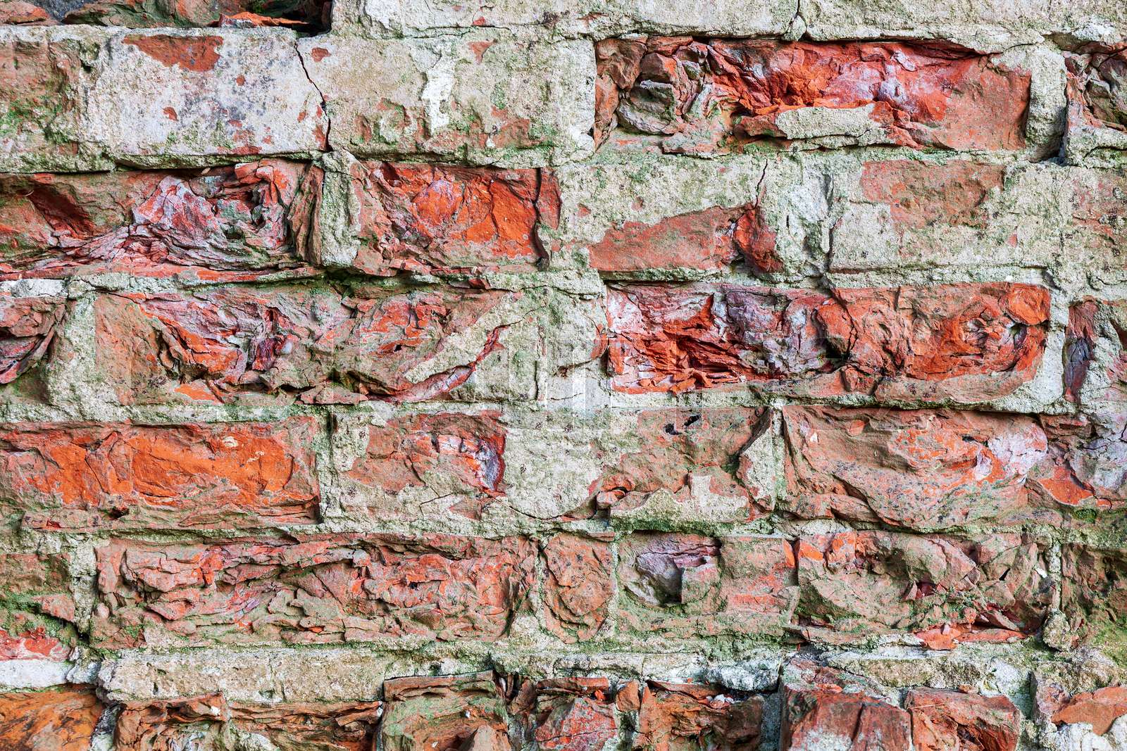 Closeup of old red damaged brick wall | Stock image | Colourbox