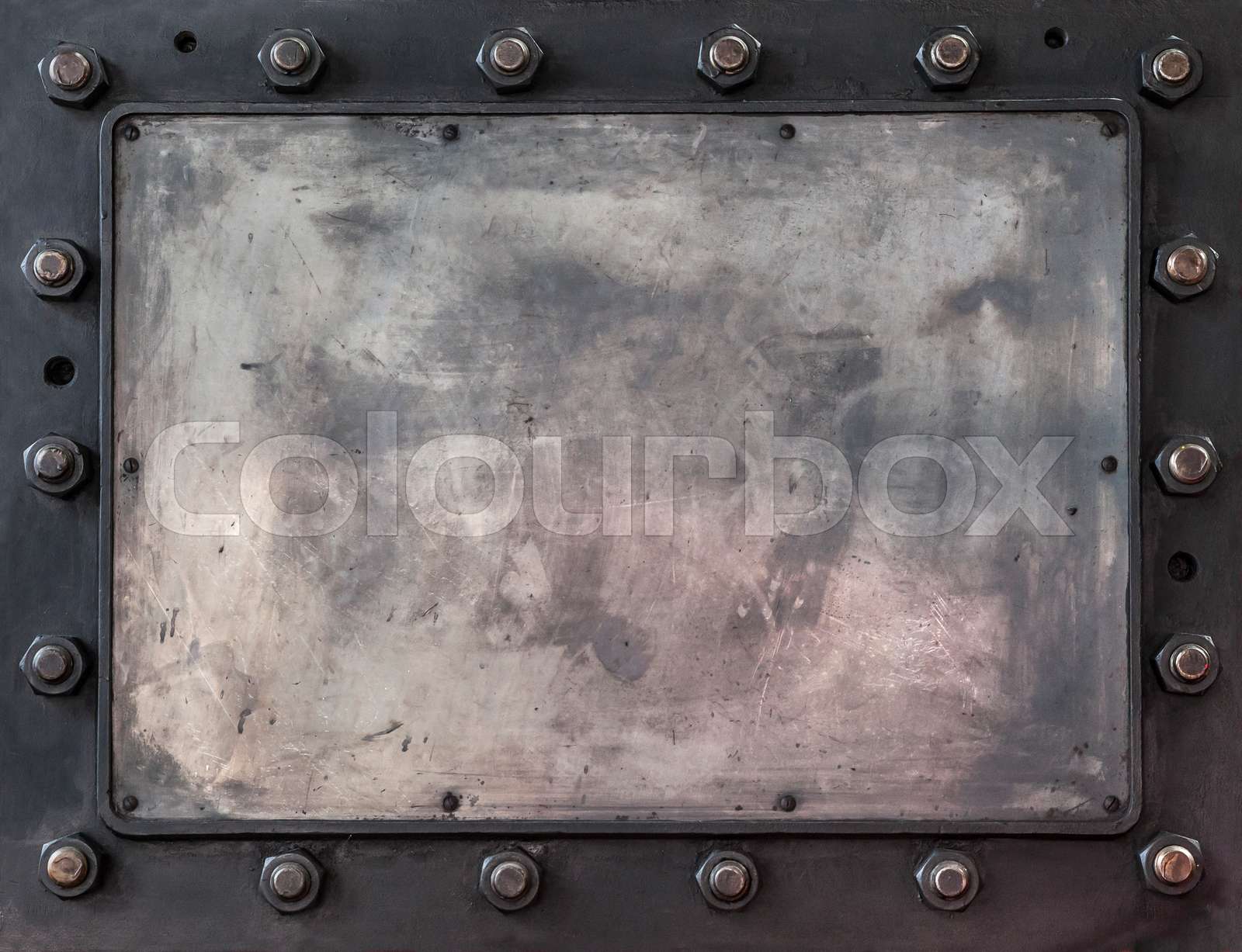 Industrial metal plate with bolts | Stock image | Colourbox