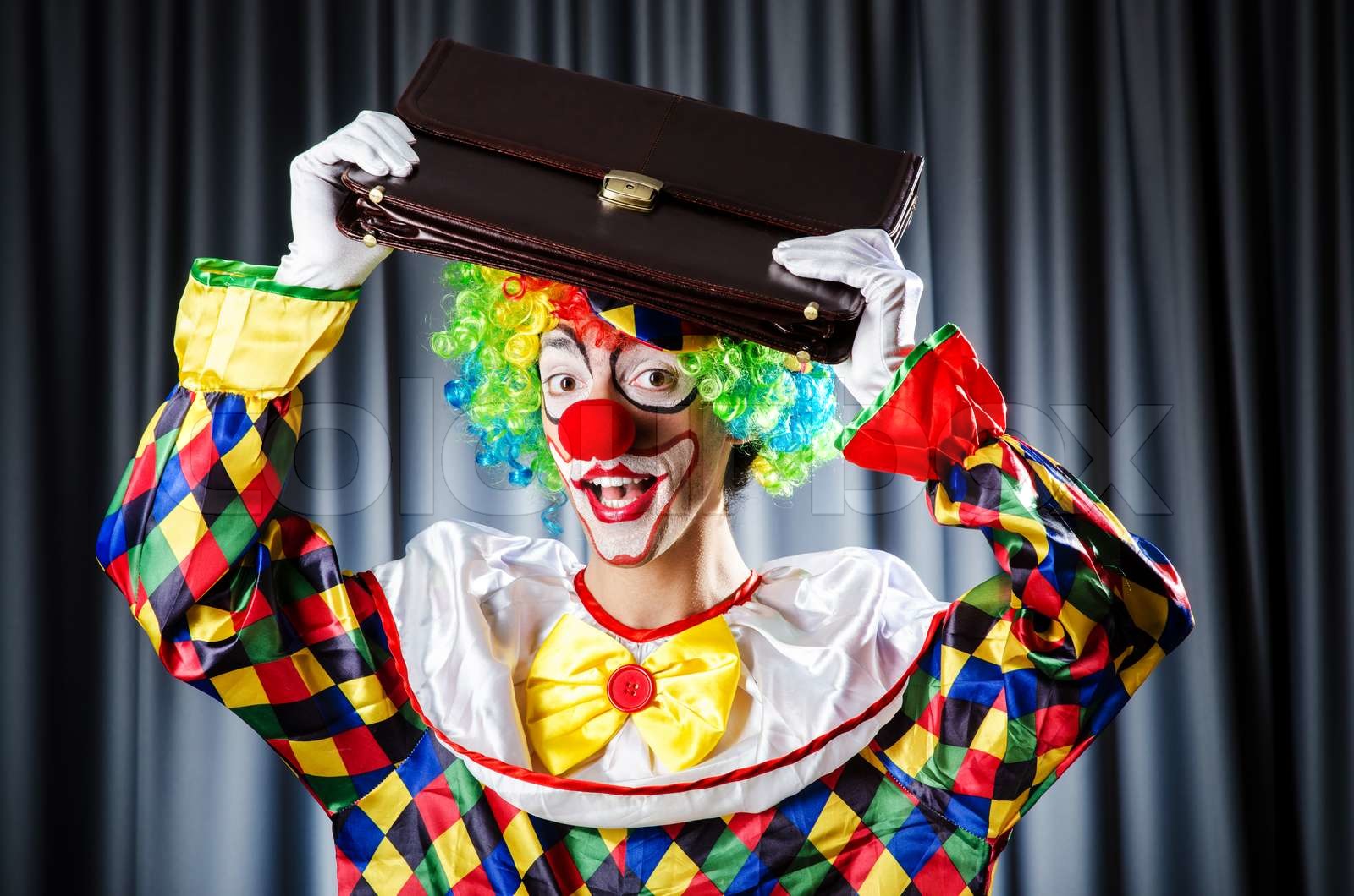 Funny clown in the studio shooting | Stock image | Colourbox