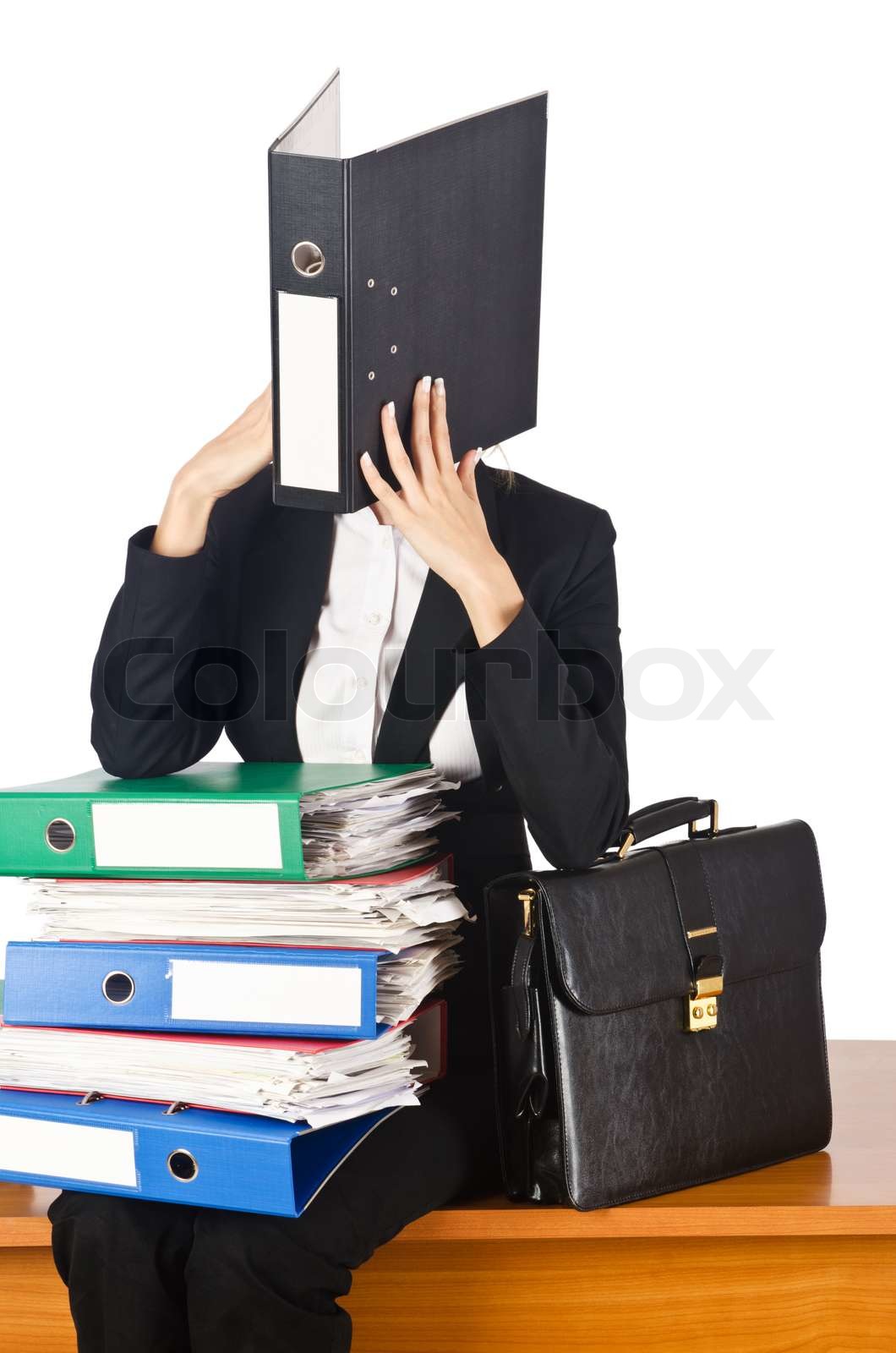 Woman with lots of work | Stock image | Colourbox