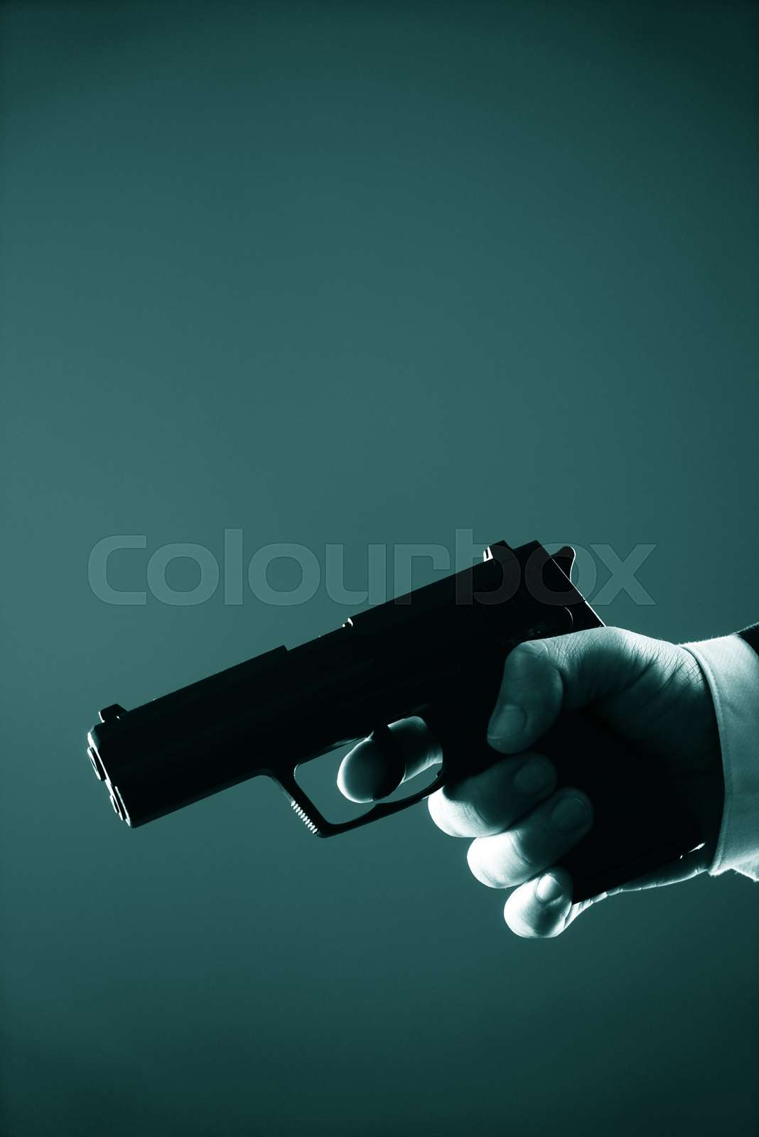 Retro secret agent gun | Stock image | Colourbox