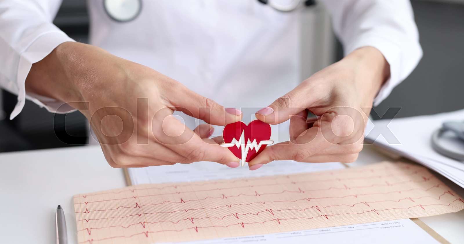 Doctor cardiologist holds heart icon in hands 4k movie | Stock video ...