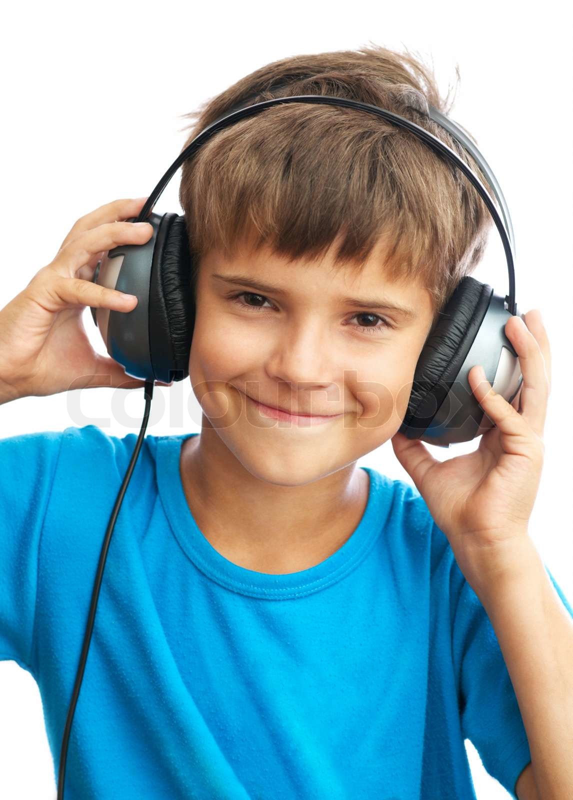 Smiling boy with headphones | Stock image | Colourbox