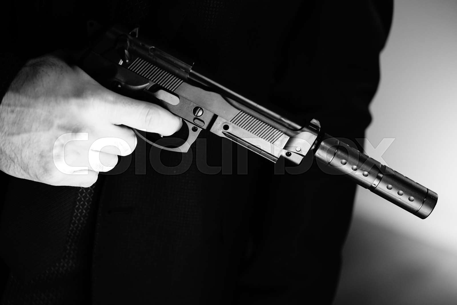 Black Man Holding Gun