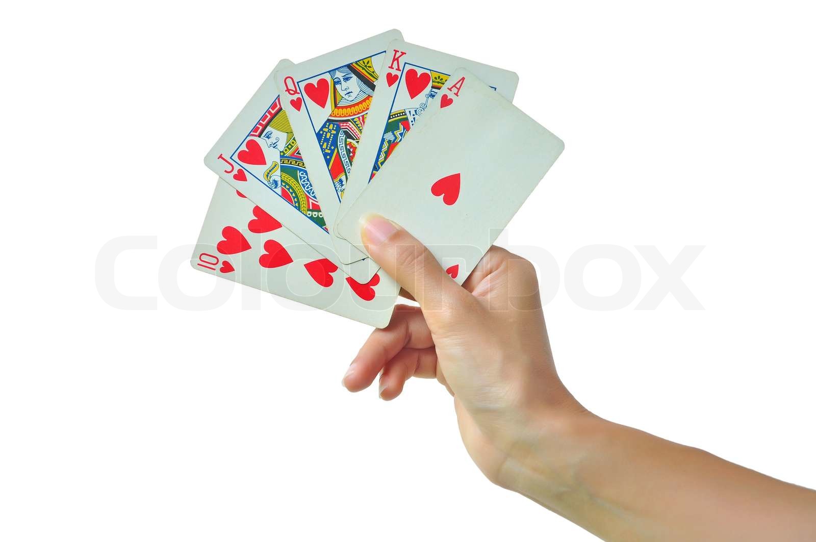 Playing cards in hand | Stock image | Colourbox