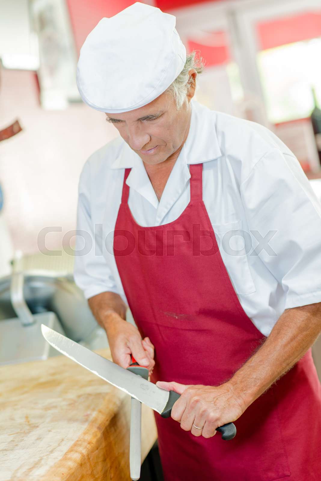 metzger, mensch, dolch | Stock Bild | Colourbox