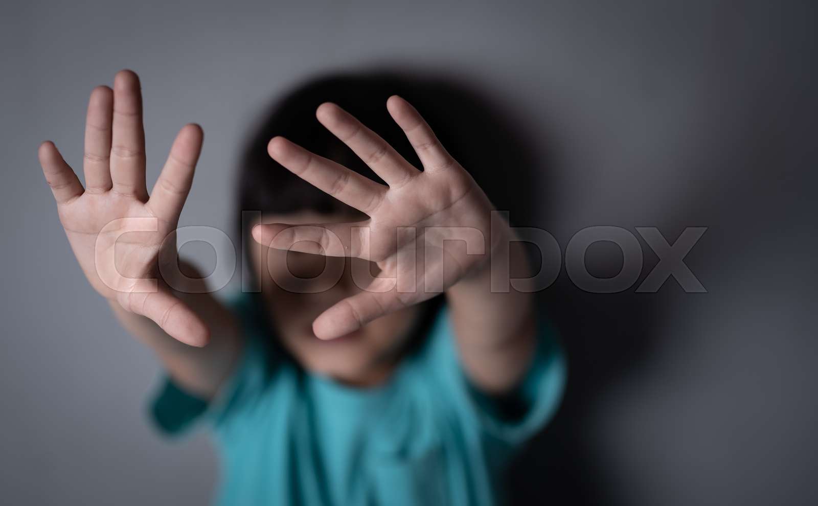 Young girl making stop gesture with her hand,Stop violence and abuse ...