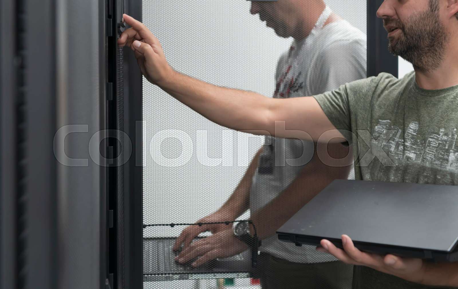 Technicians team updating hardware inspecting system performance in ...