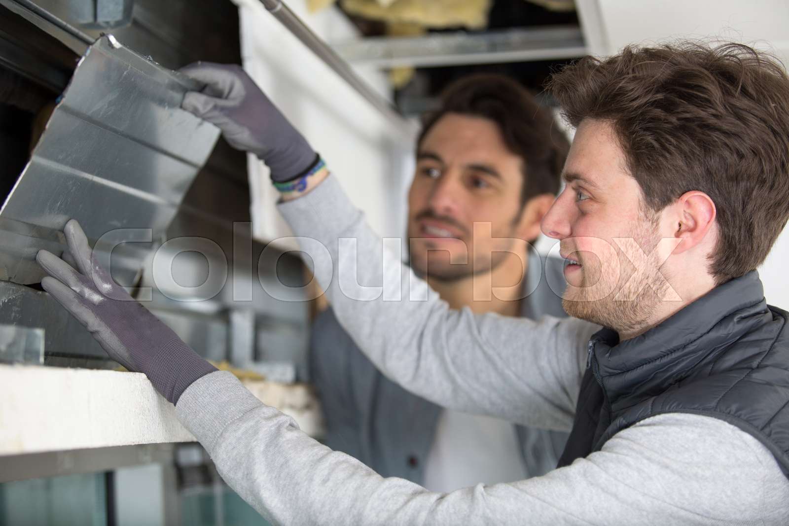 concept of windows installation workers | Stock image | Colourbox