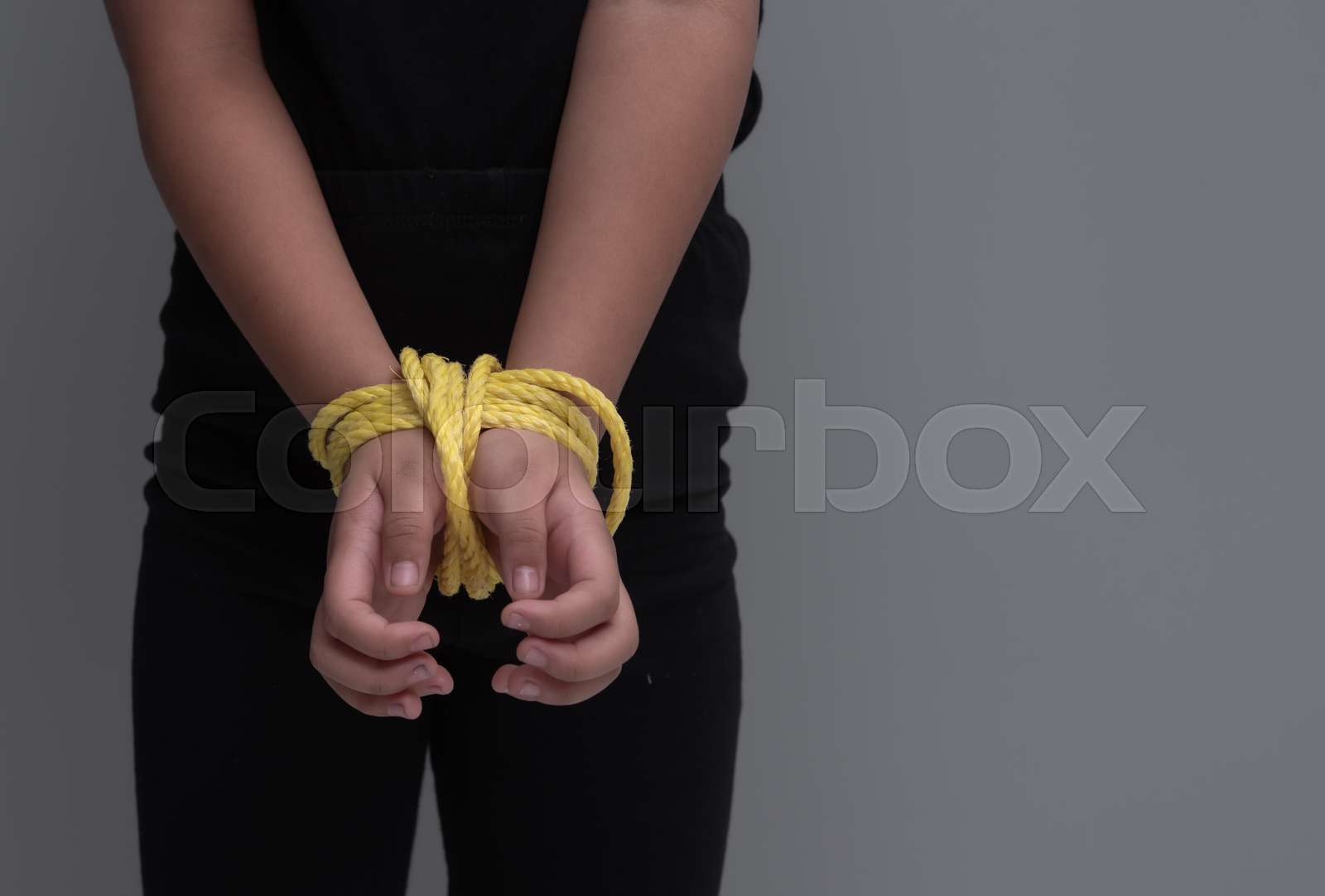 Child's hands tied with rope ,kidnapping concept | Stock image | Colourbox