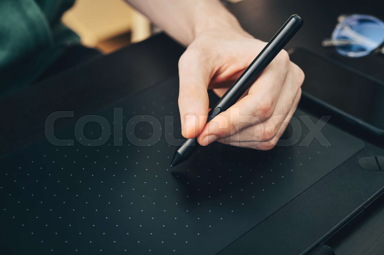Man using graphic tablet for drawing | Stock image | Colourbox