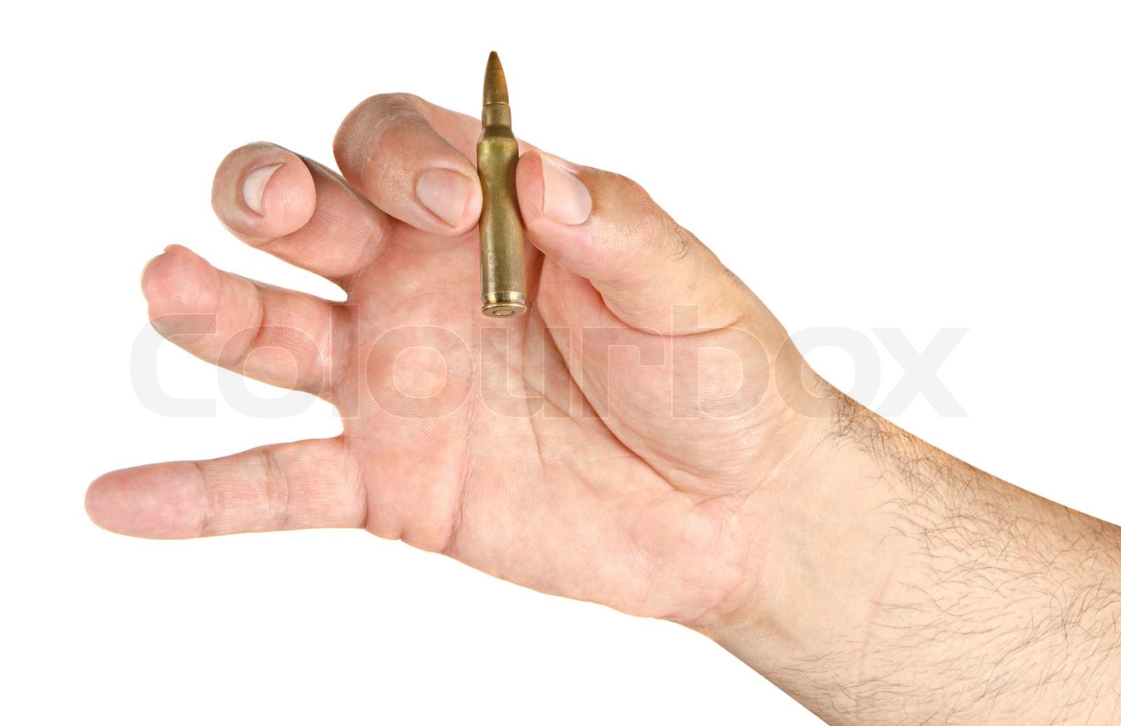bullet in hand | Stock image | Colourbox