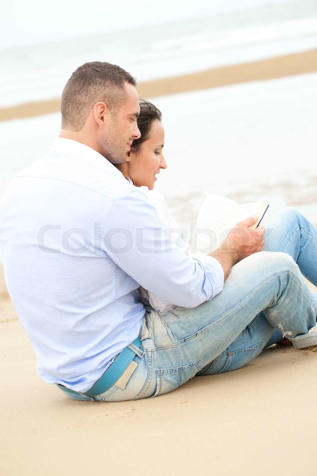 Couple reading book | Stock image | Colourbox