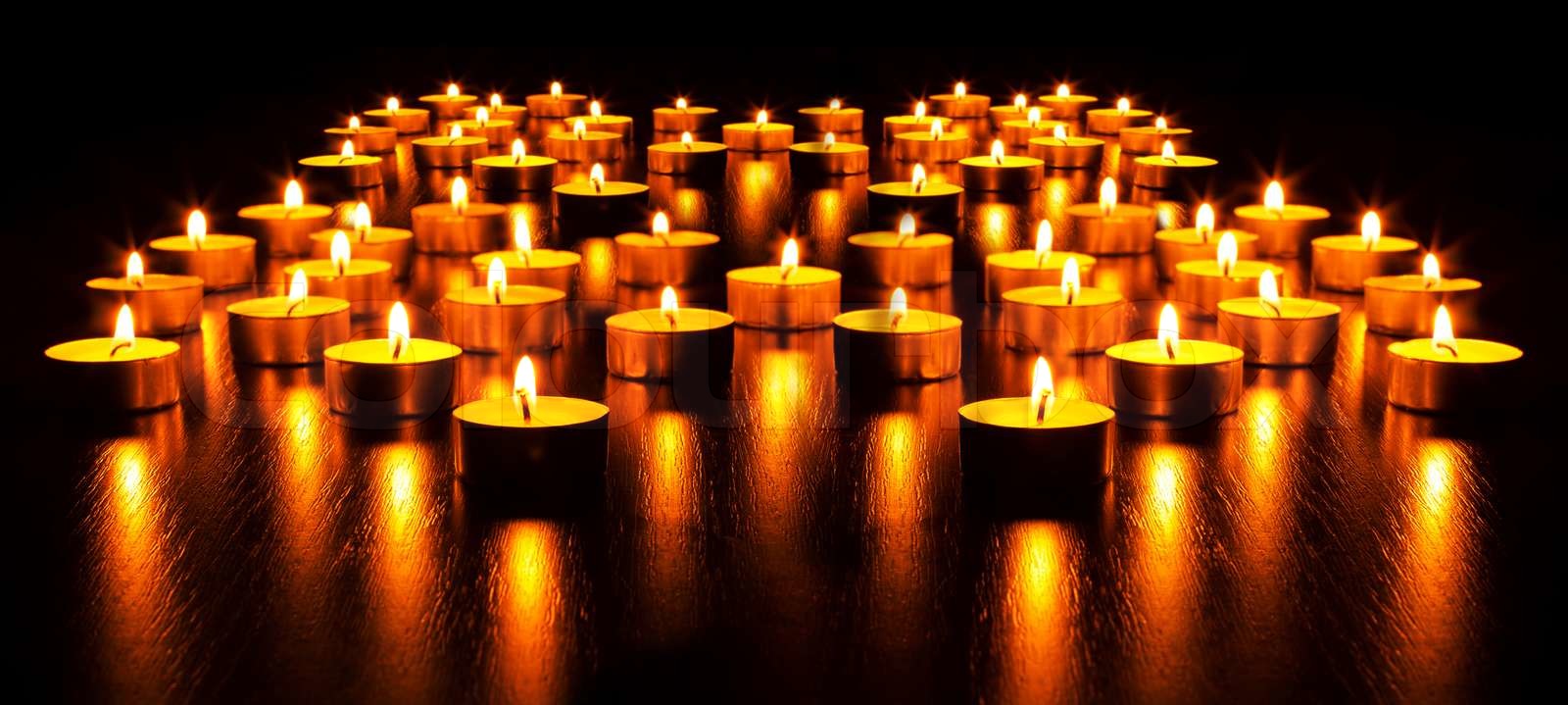 Panorama of the many burning candles | Stock image | Colourbox