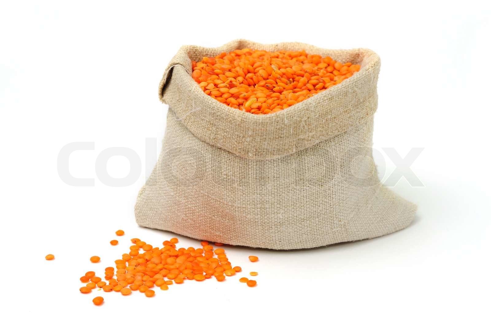 Orange lentils in a sack | Stock image | Colourbox