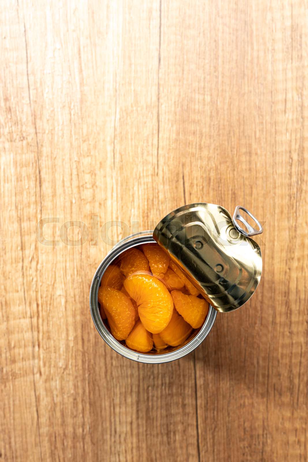 Canned tangerine. Pickled mandarin fruit in can. | Stock image | Colourbox