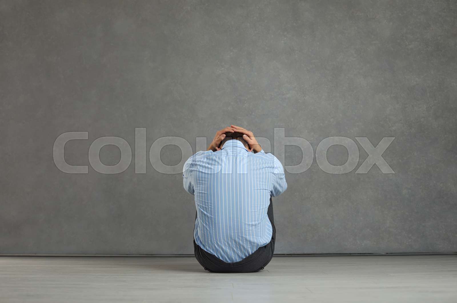 Person Sitting Back View