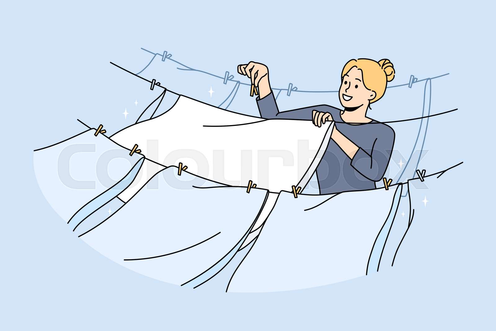 Smiling housewife hanging wet clothes outdoors | Stock vector | Colourbox