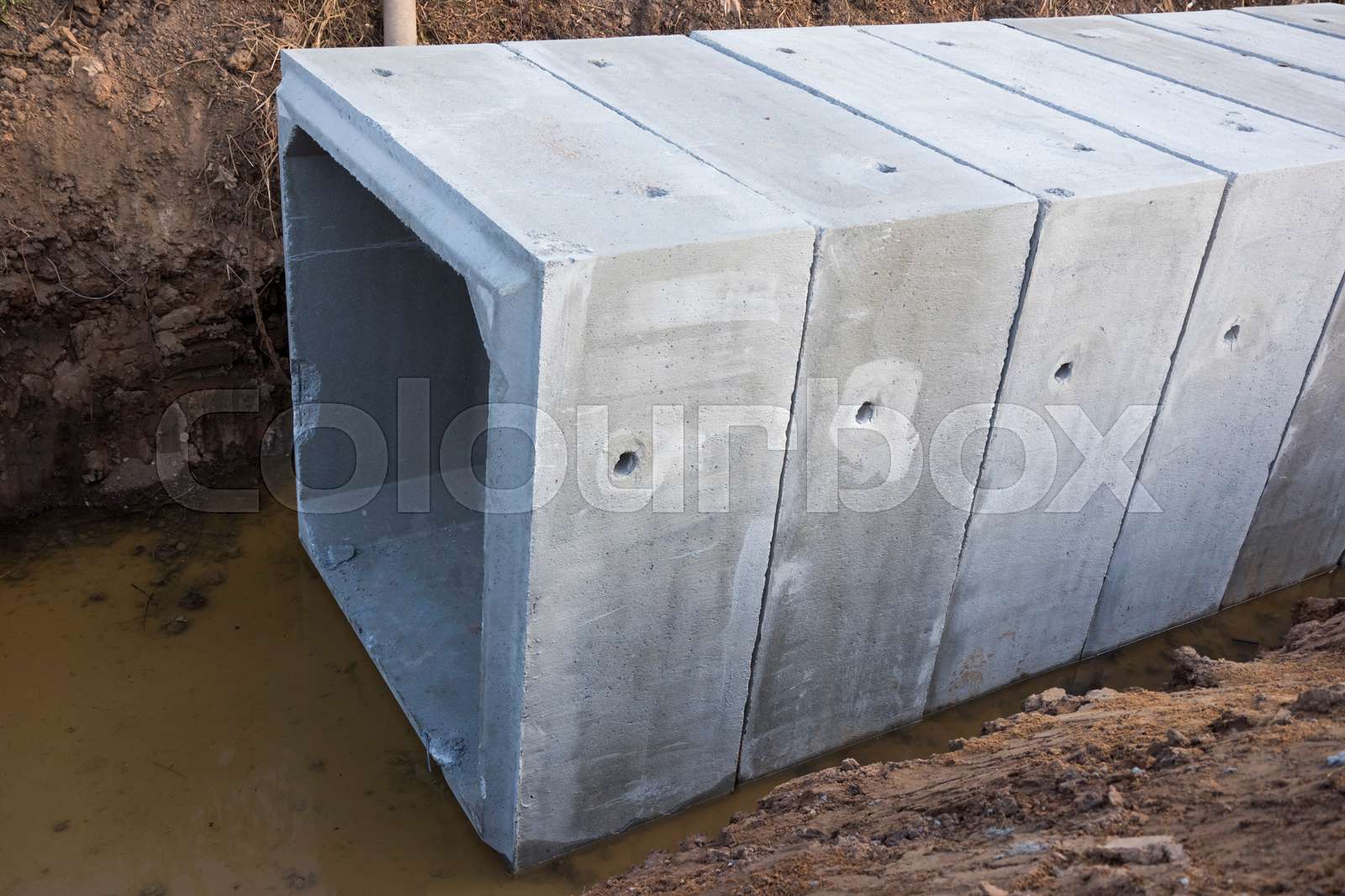 Large size square concrete manholes are installed at construction site ...