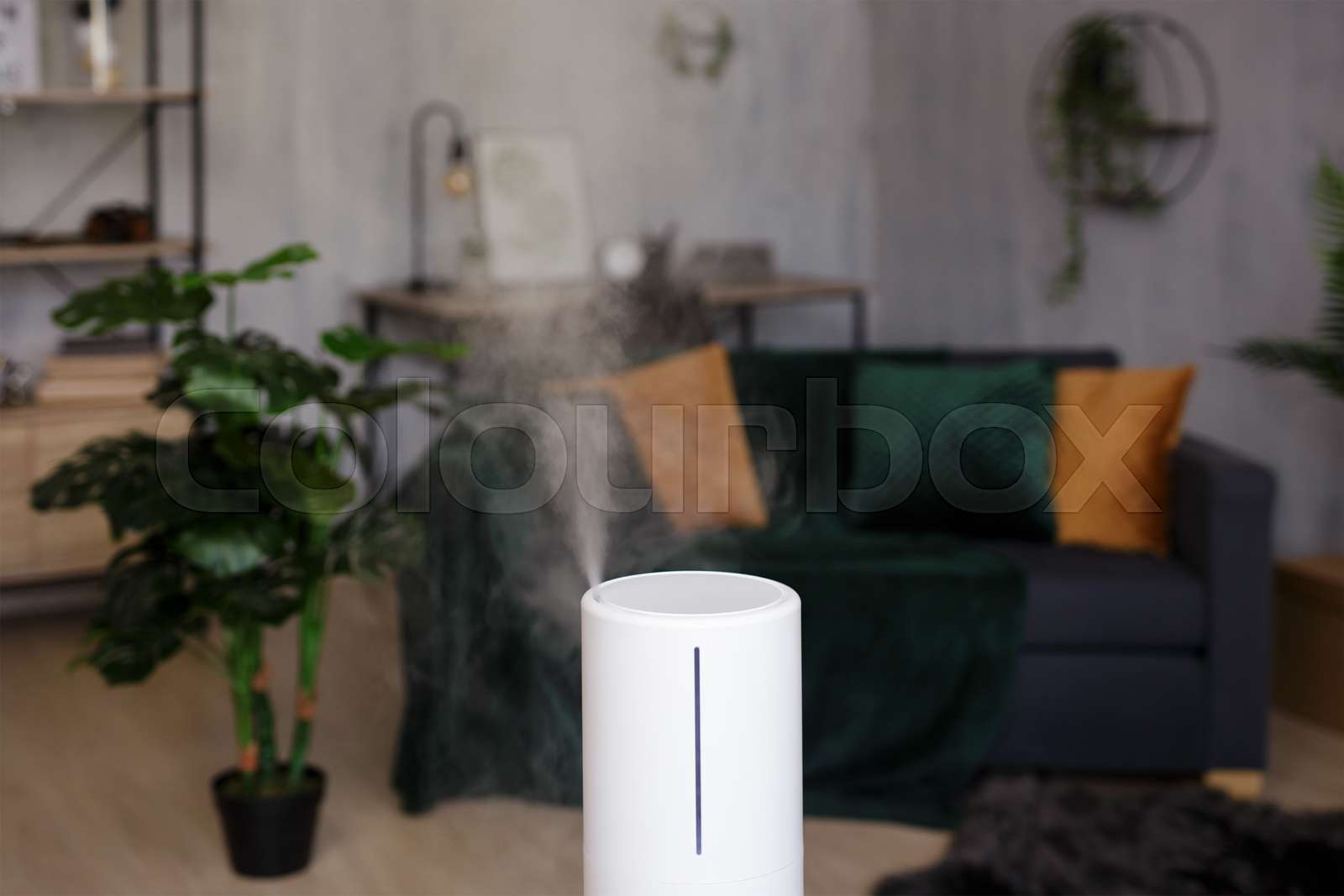working air humidifier in living room with modern scandinavian interior ...