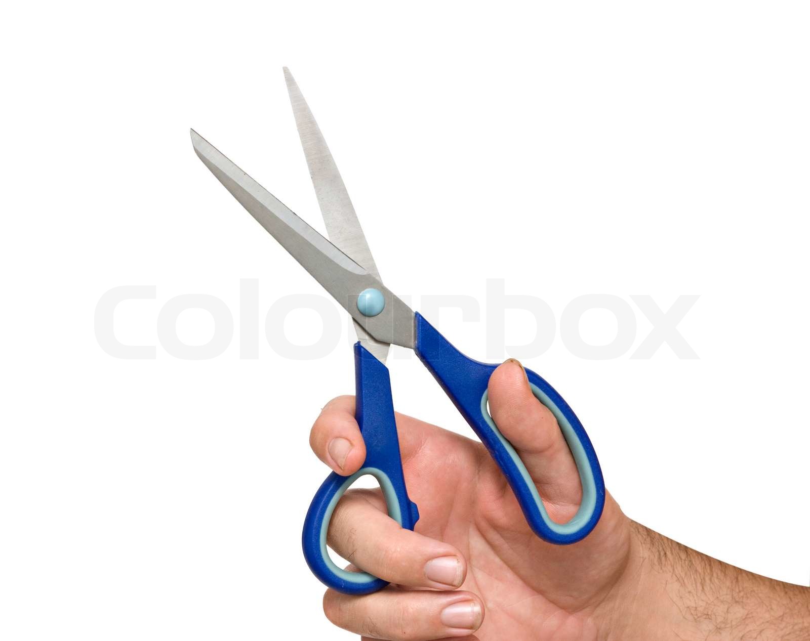 Hand with scissors | Stock image | Colourbox