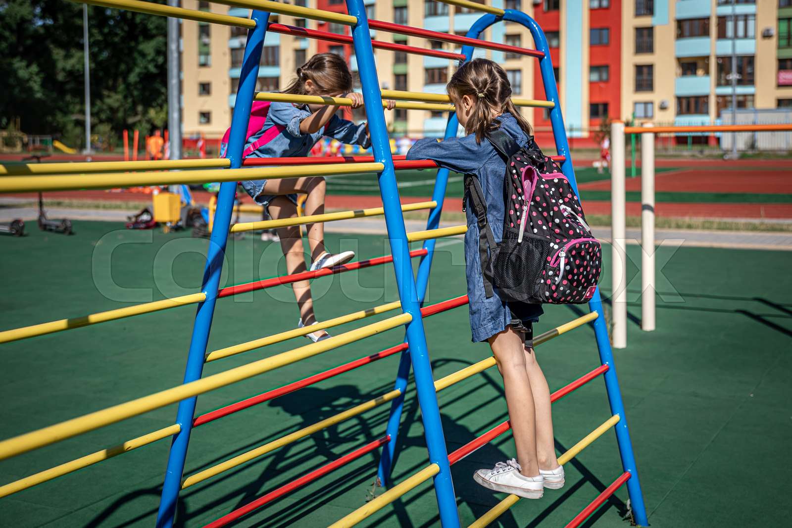 Elementary school students playing on the school playground. | Stock ...