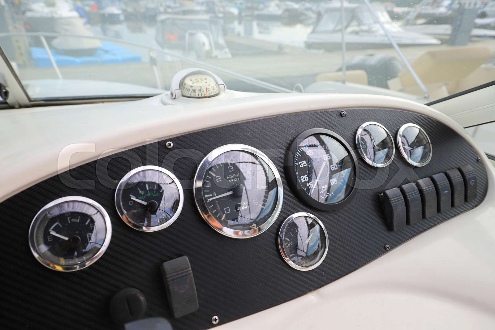 Motor boat dashboard with navigation devices | Stock image | Colourbox