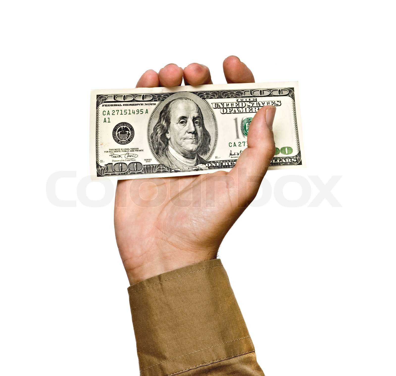 Dollar in hand | Stock image | Colourbox