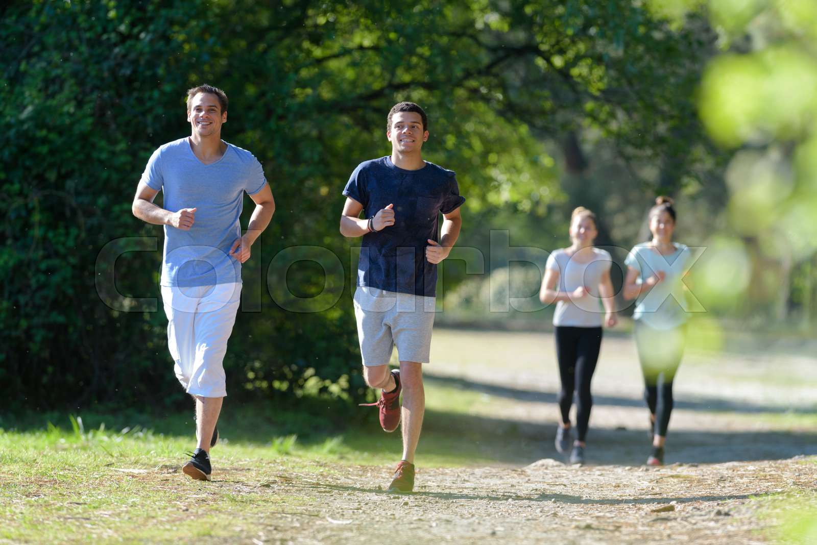 young people running in nature | Stock image | Colourbox