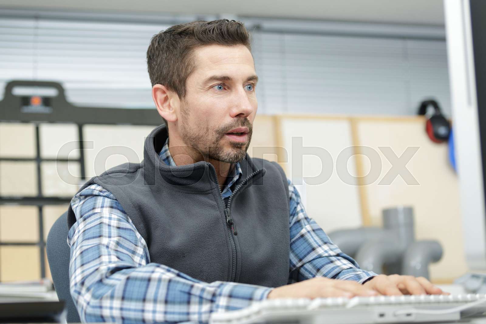 man working with a computer pc | Stock image | Colourbox