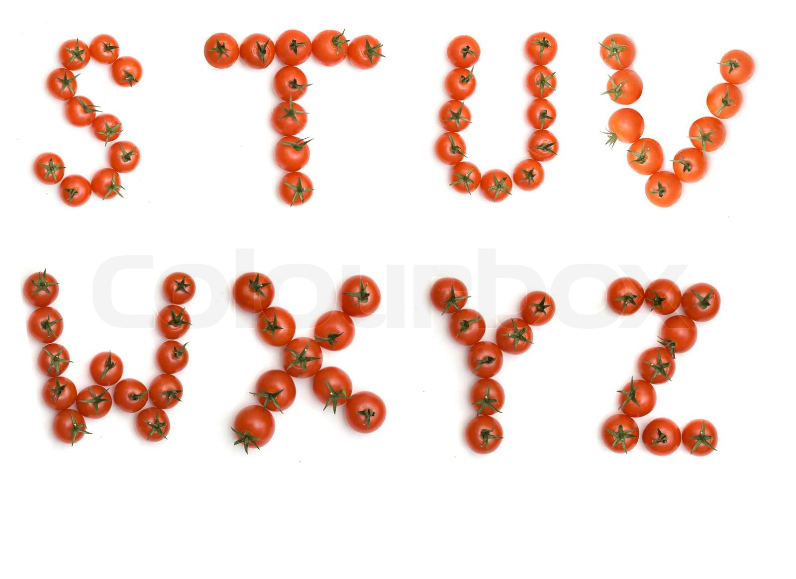 Letters of English alphabet formed from tomatoes | Stock image | Colourbox