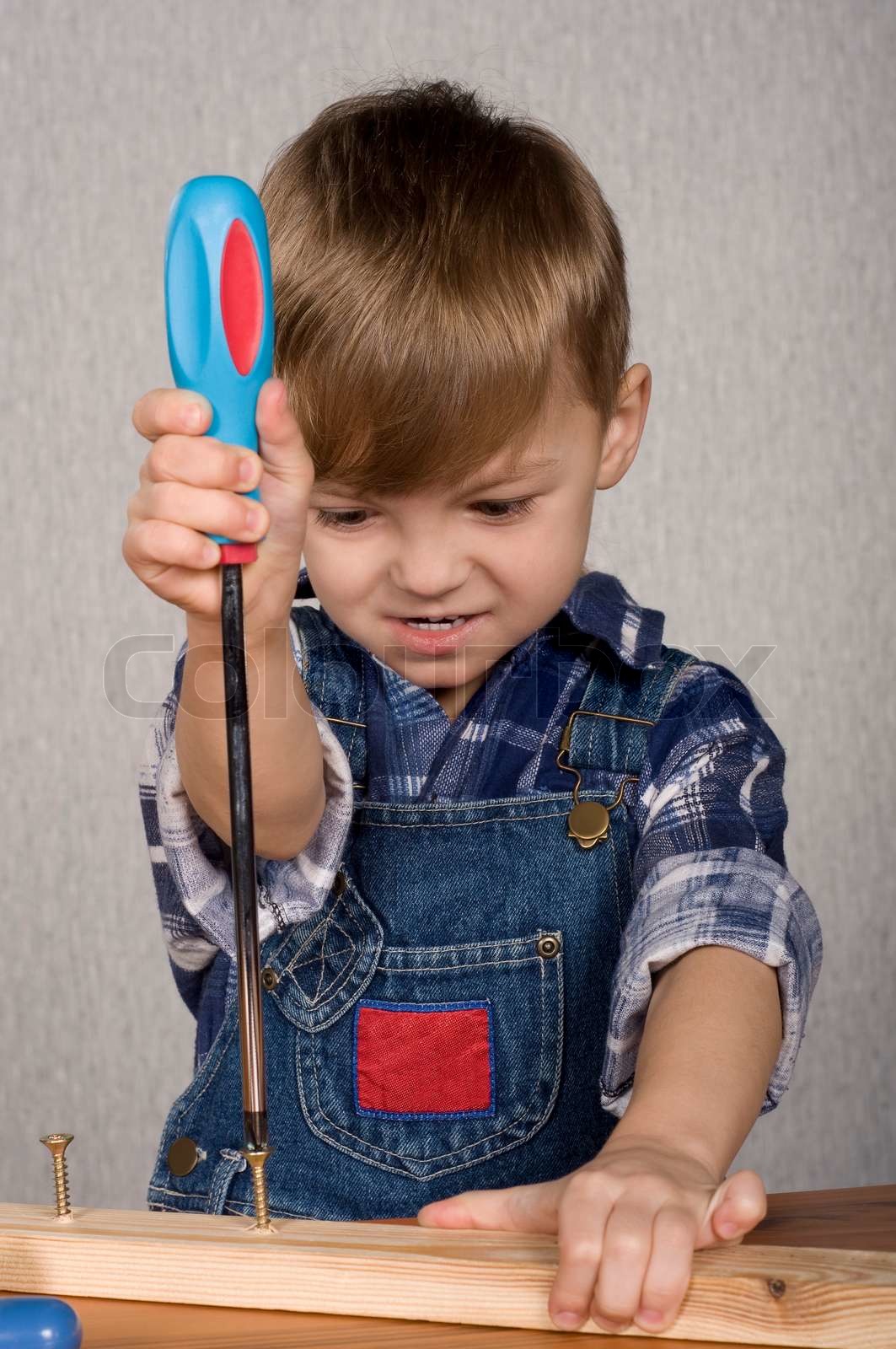 Boy with tools | Stock image | Colourbox