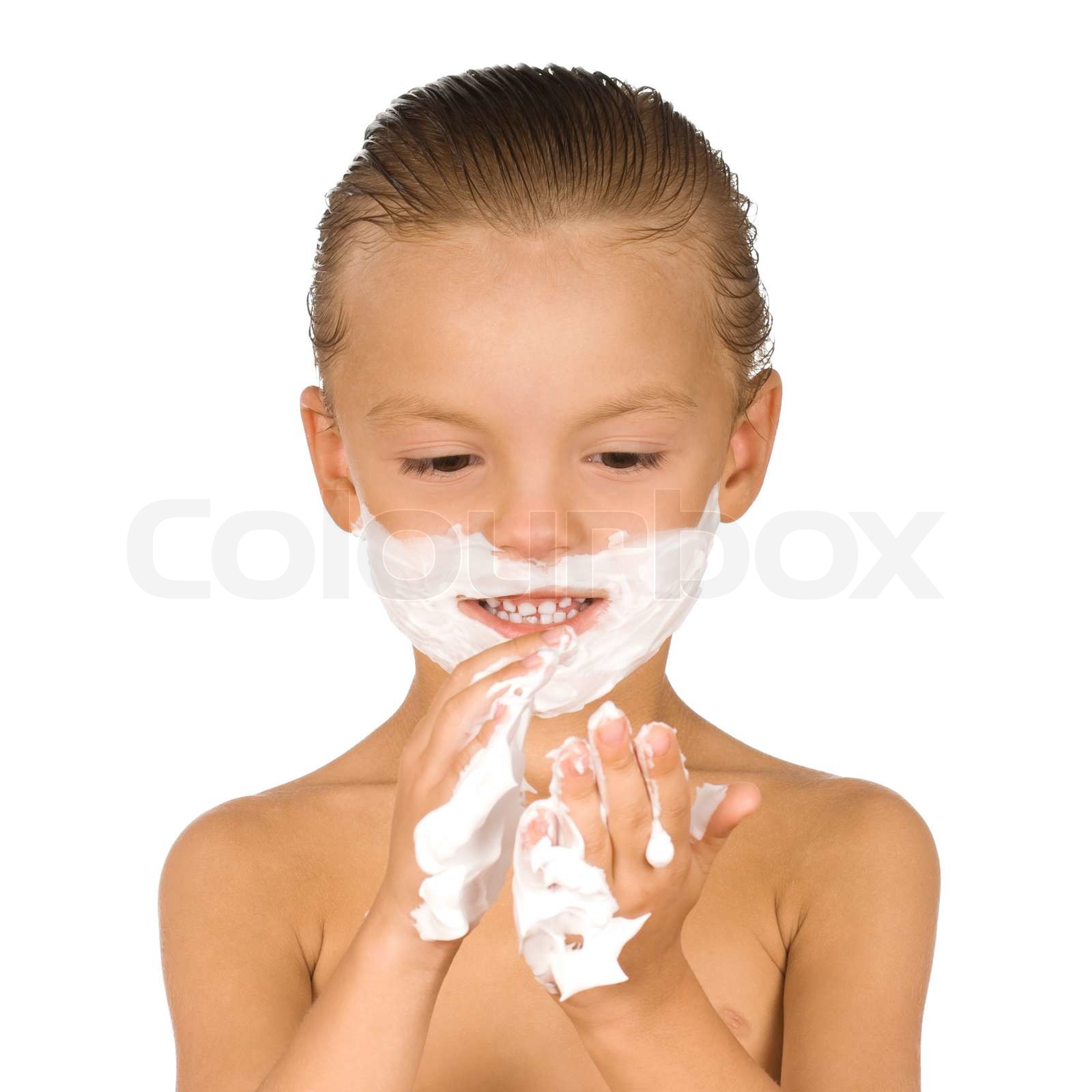 Boy shaving | Stock image | Colourbox
