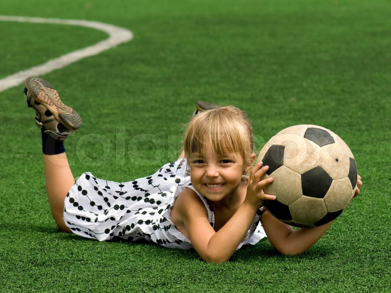 Girl with soccer ball | Stock image | Colourbox