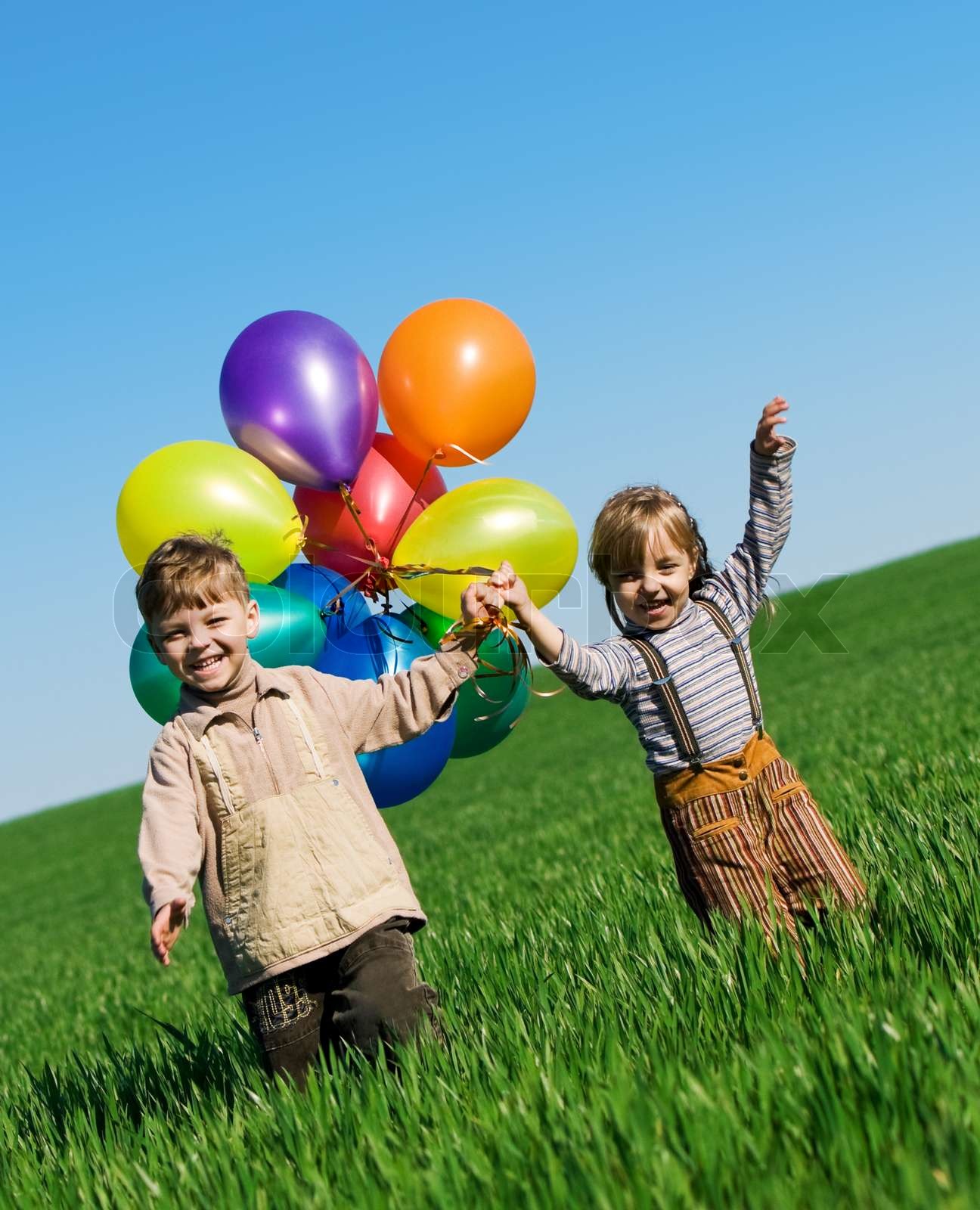 Children with balloons | Stock image | Colourbox