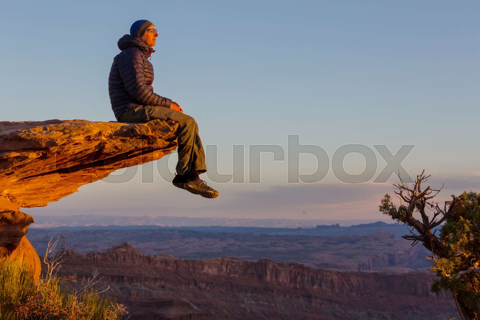 Man on the cliff | Stock image | Colourbox